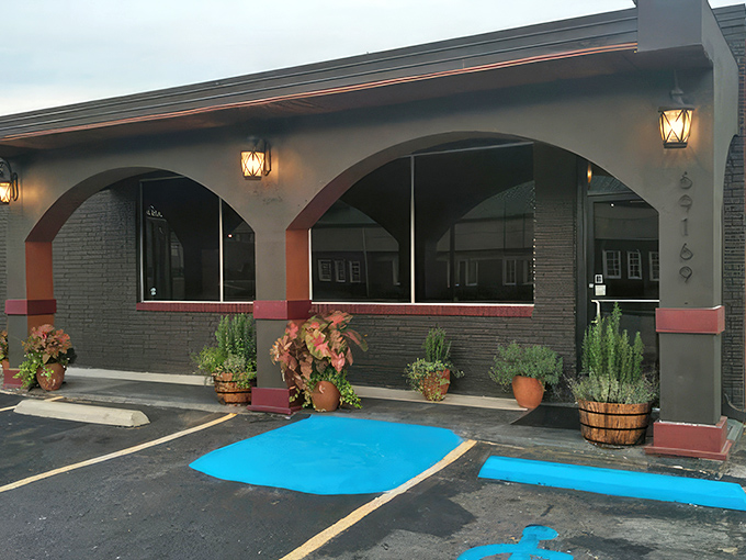 Fuego Steakhouse: Fuego's distinctive arched windows and understated charm &ndash; where Blountsville residents have been keeping their steak sanctuary to themselves.