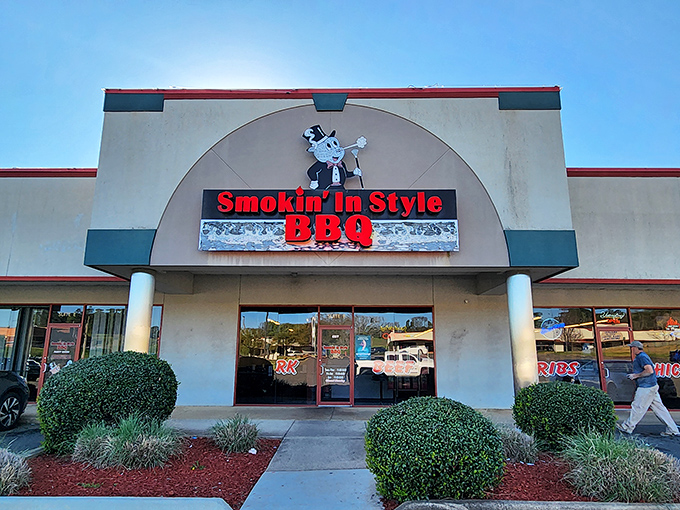 Smokin' in Style BBQ: "Architectural arches frame barbecue artistry. The cartoon pig mascot isn't smiling because he knows what's happening inside."