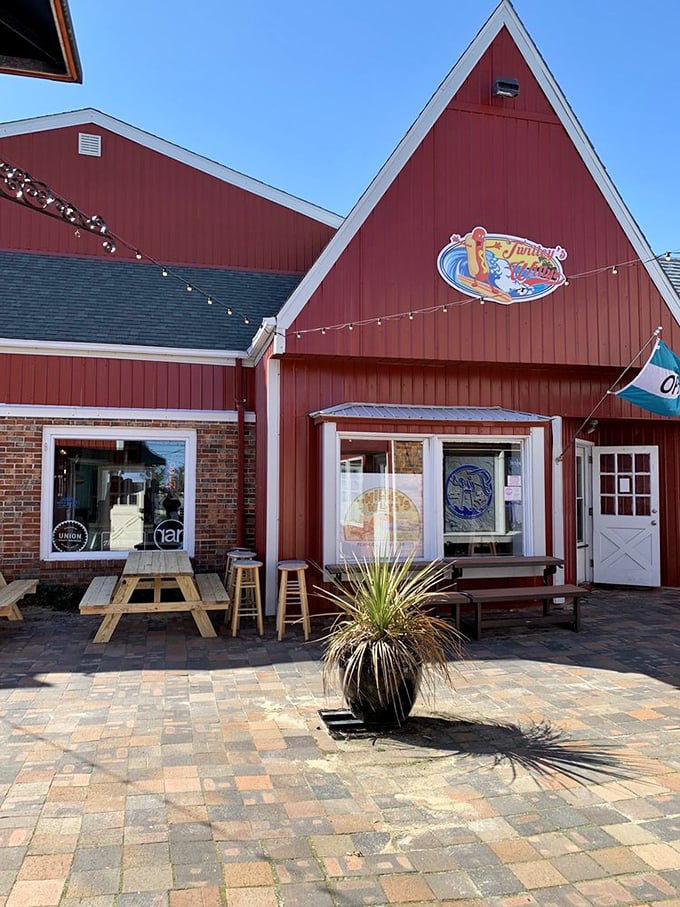 Twilley's barn-red exterior and string lights create the perfect coastal backdrop for a post-beach hot dog pilgrimage.