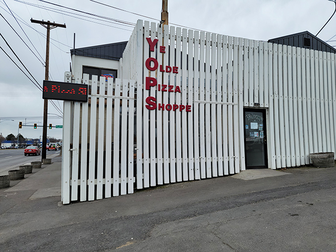 Ye Olde Pizza Shoppe's white picket fence exterior is the pizza equivalent of a mullet &ndash; business outside, party inside.