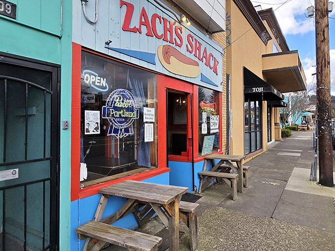 Zach's Shack: The vibrant blue exterior with its bold red door says "Yes, we take hot dogs seriously, but we're also here to have a good time."