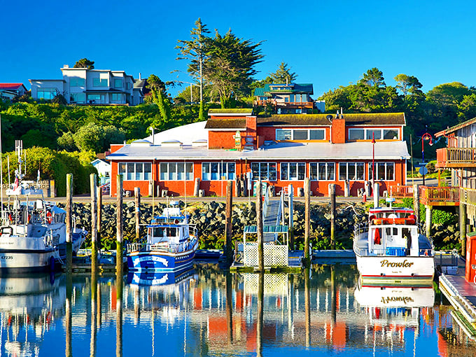 The harbor at Bandon reflects colorful buildings in waters that have witnessed generations of fishing tales &ndash; some even true!