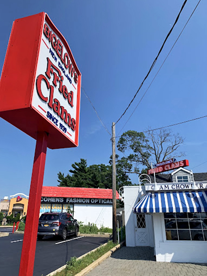 The striking red sign above the roadside stand is like a lighthouse for the seafood obsessed. Follow it to fried clam nirvana!