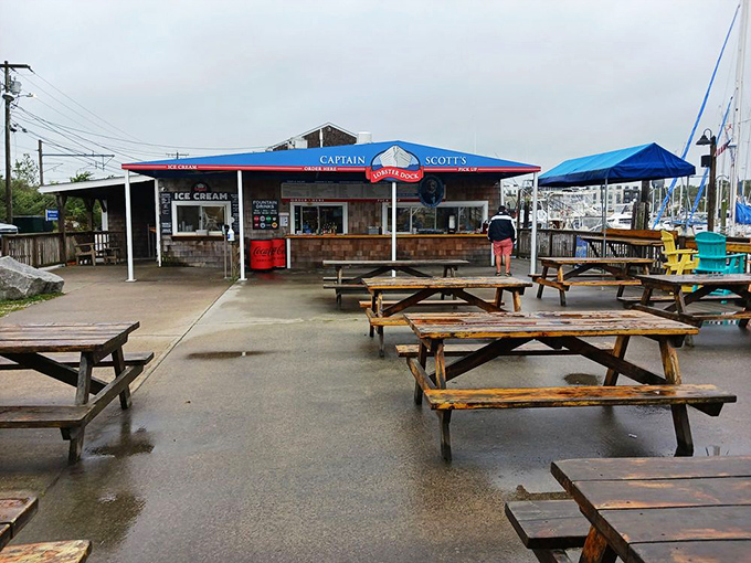 Even on rainy days, Captain Scott's blue awnings create a haven for seafood devotees who understand that greatness can't be stopped by weather.