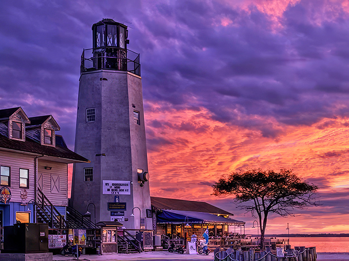 Sunset paints Dewey's lighthouse in breathtaking hues&mdash;Mother Nature showing off her artistic side at day's end.
