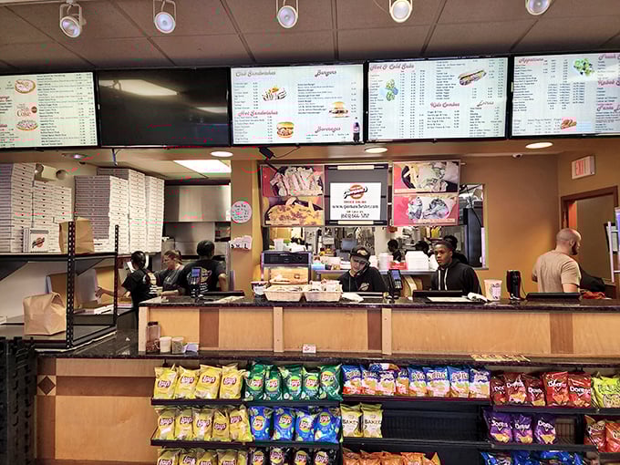 The bustling counter service moves with the precision of a pizza ballet, where every movement ends with delicious results.