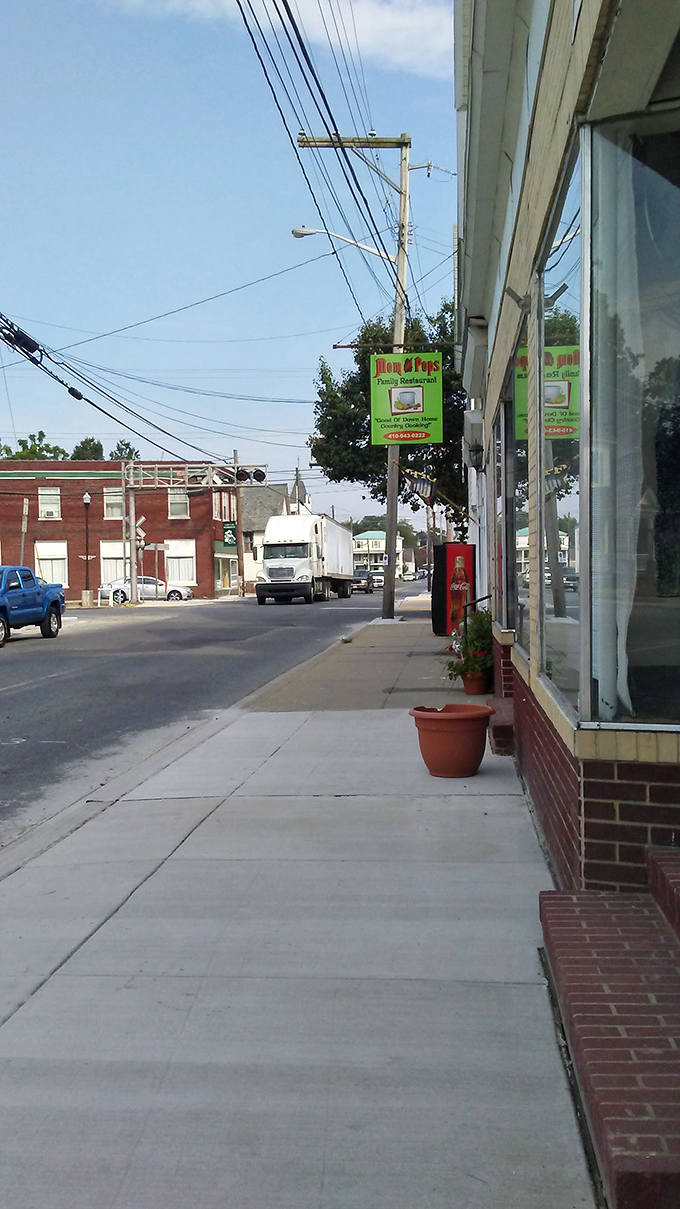 The unassuming street view of Mom -n- Pop's &ndash; where small-town charm meets big-time flavor in Maryland's heartland.