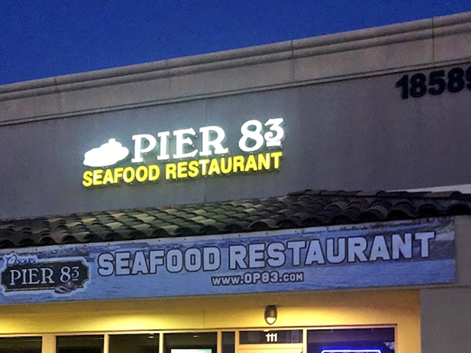 By night, Oscar's glowing sign becomes a beacon for those who know that extraordinary seafood often hides in ordinary places.