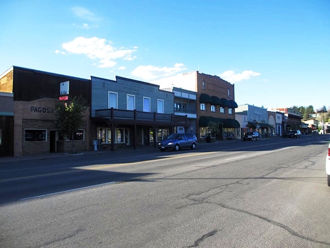 The buildings of Pagosa Springs stand tall despite knowing they'll never outgrow those mountains&mdash;talk about living in someone's shadow!