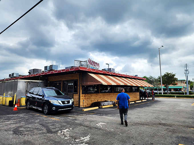 Twilight at Shorty's, when the neon glows and the smokers still puff&mdash;magic hour for BBQ lovers in Miami.