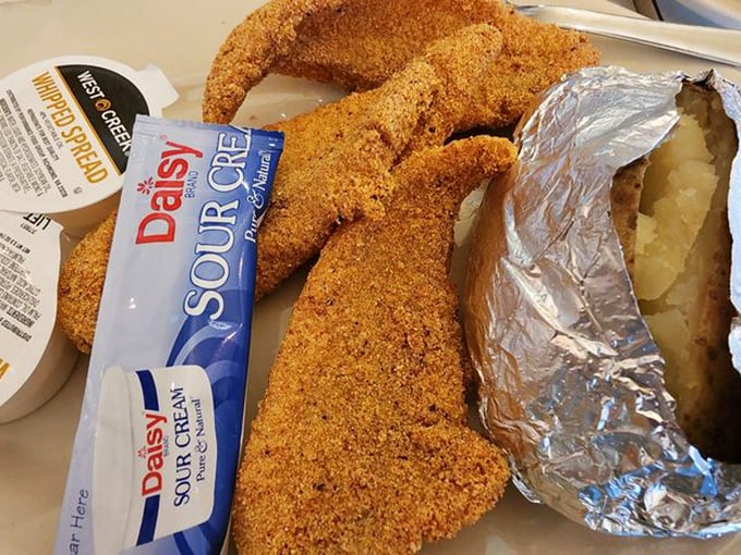 Cornmeal-crusted catfish with a baked potato that's dressed for success&mdash;comfort food that gives you an actual hug.