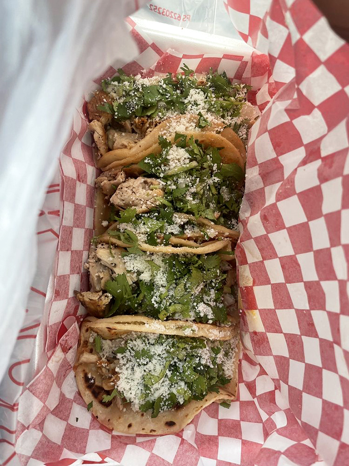 Four tacos lined up like soldiers ready for battle&mdash;the only casualties will be your hunger and your diet plans.