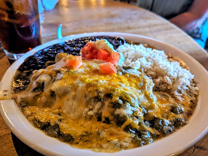 Enchiladas swimming in chile and cheese&mdash;the kind of dish that makes you want to hug the chef. New Mexico comfort food at its most comforting.
