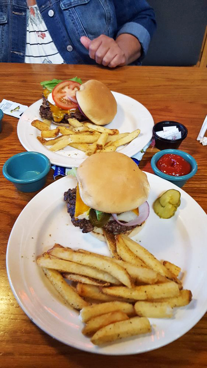 These aren't just burgers&mdash;they're hand-formed manifestations of beef perfection. The kind that make fast-food chains weep with inadequacy.