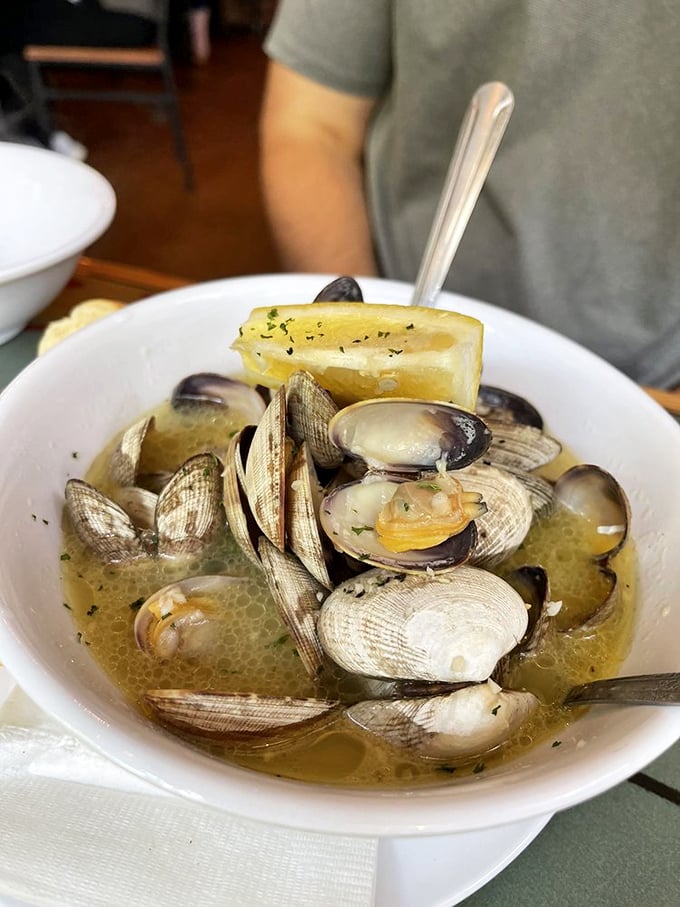 These steamed clams swimming in garlicky broth are proof that sometimes the simplest preparations yield the most profound pleasures.