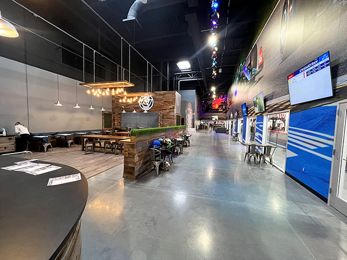 The dining area offers a perfect vantage point to fuel up while watching others navigate turns you just catastrophically failed.