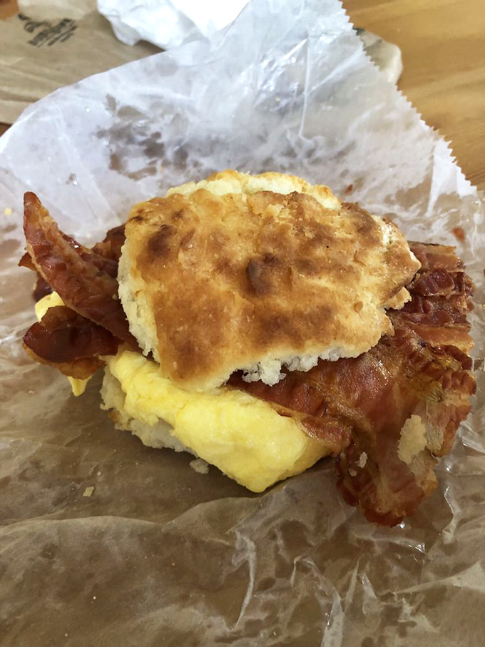 This isn't just breakfast; it's an edible work of art. Layers of bacon, egg, and cheese create a symphony in biscuit form.
