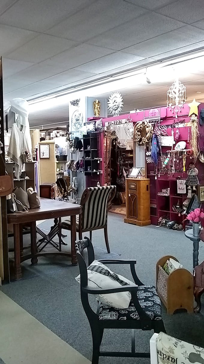 The pink accent wall creates a dramatic backdrop for treasures both practical and whimsical&mdash;theater for the everyday object.