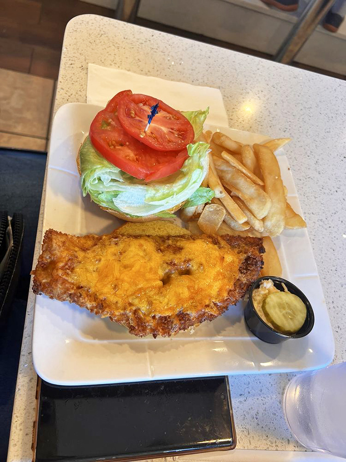 Golden-fried perfection meets fresh garden crispness&mdash;this sandwich isn't just lunch, it's a midday vacation between two pieces of bread.