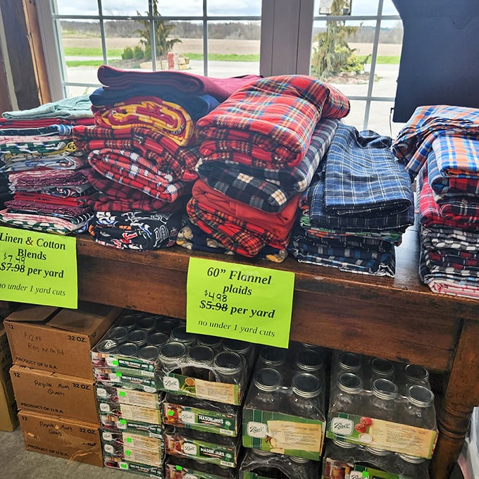 Flannel heaven for the tactile shopper&mdash;stacks of cozy plaids promising pajamas, quilts, and the warmth of handmade comfort.