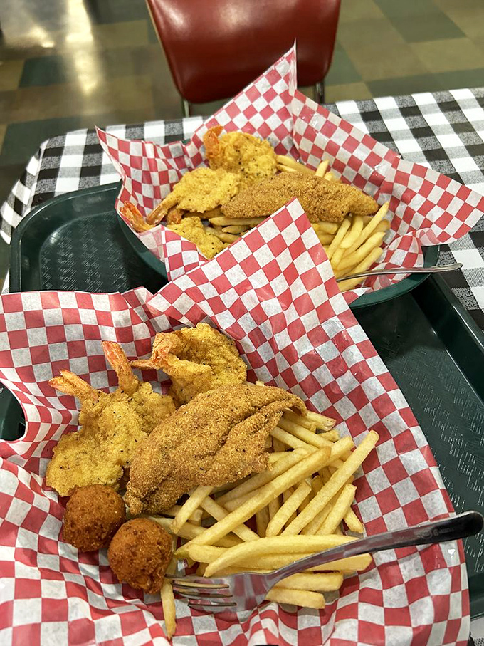 Golden-fried treasures from Neptune's kingdom. The basket arrives with enough seafood to make landlocked diners forget they're in Arkansas.