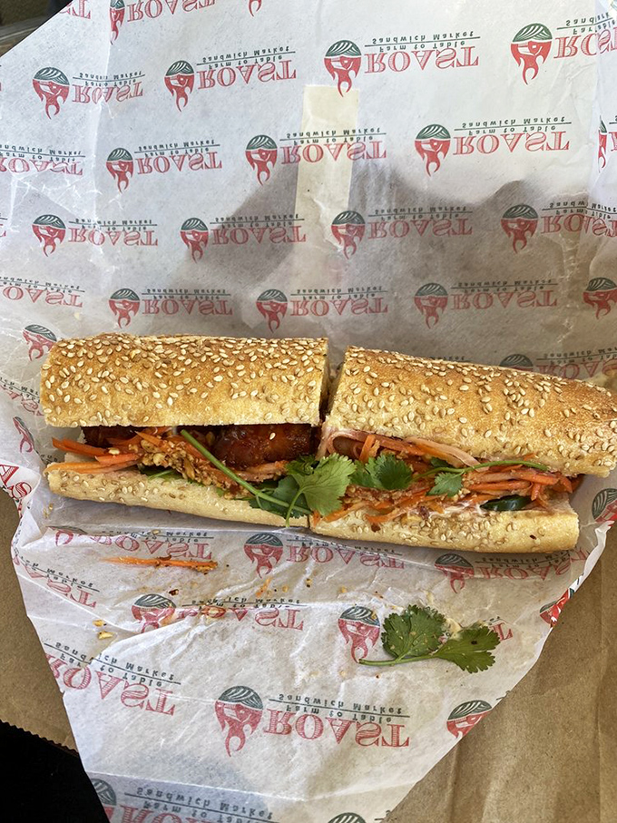 East meets East in this cultural handshake &ndash; crispy, savory elements nestled in a sesame baguette that could bring world peace, one bite at a time.