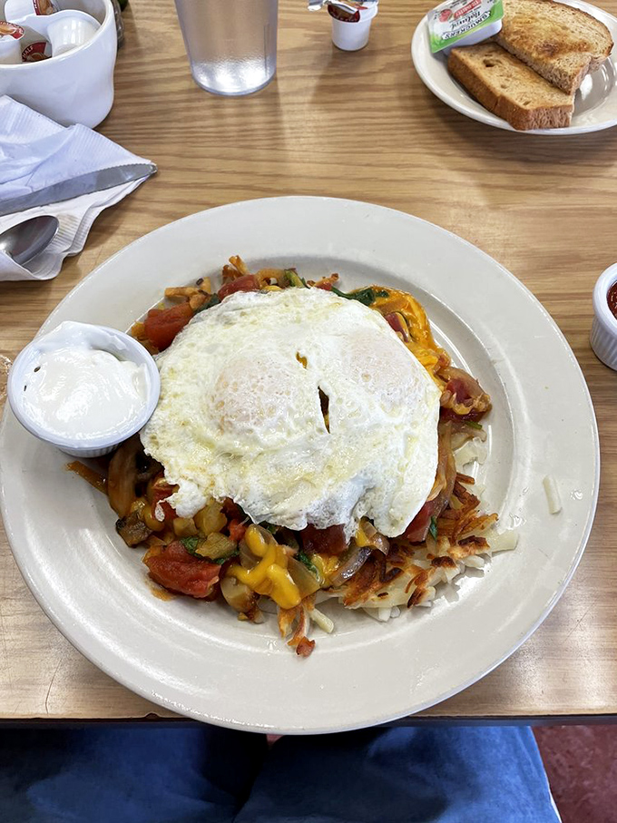 Georgia's Potatoes Deluxe – when your hash browns graduate summa cum laude and get promoted to the breakfast hall of fame.