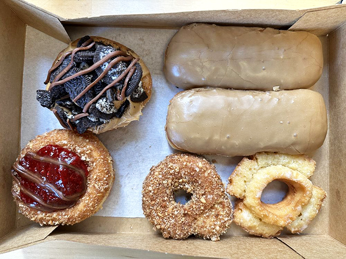 A perfectly-curated half dozen that hits every note in the donut symphony &ndash; from sprinkles to twists, maple to chocolate.