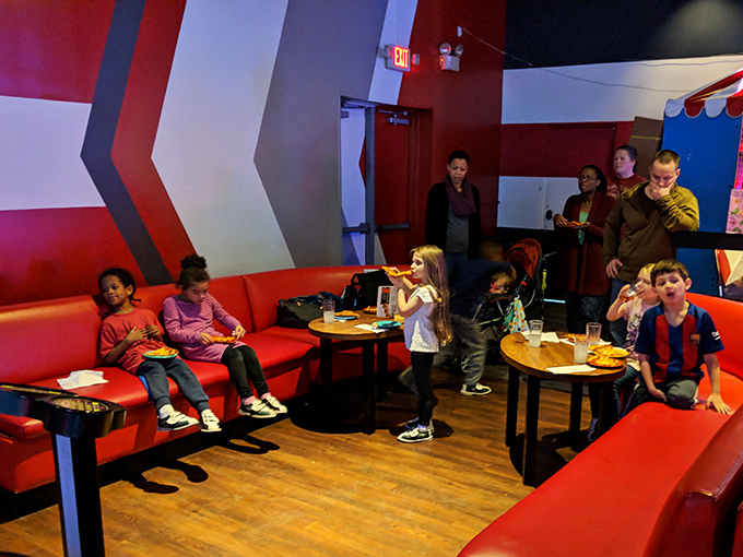 The lounge area's geometric red walls and comfortable seating create the perfect backdrop for celebrating that elusive turkey&mdash;three strikes in a row!