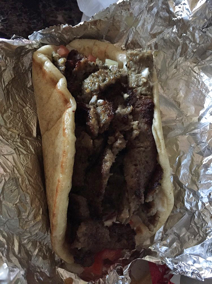 The gyro so substantial it has its own gravitational pull. Eating this beauty requires strategy, napkins, and zero shame.
