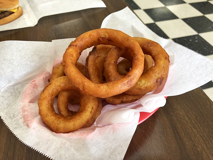 Golden, crispy onion rings that shatter with each bite&mdash;the supporting actors that often steal the culinary show.