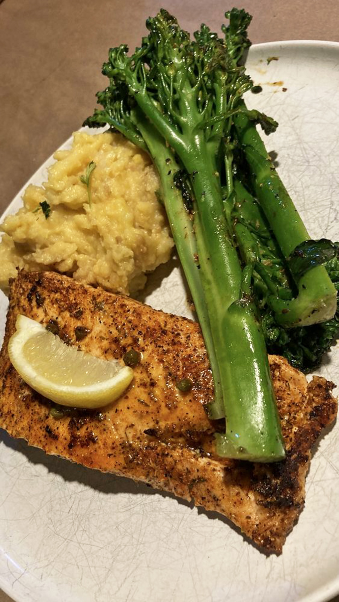 This salmon filet with its perfect herb crust proves that sometimes the simplest preparations yield the most spectacular results.