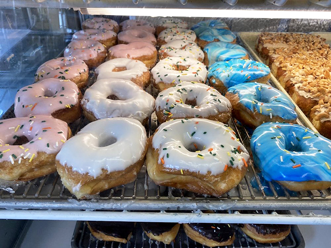 Valentine's Day expressed in doughnut form &ndash; because nothing says "I love you" like strategic sprinkle placement and sugar-coated commitment.