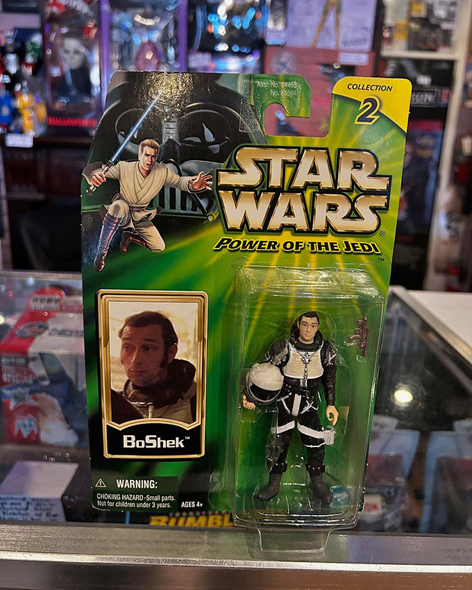 Star Wars: Power of the Jedi's BoShek figure remains sealed in his original packaging&mdash;a time capsule from a galaxy far, far away that never went out of style.