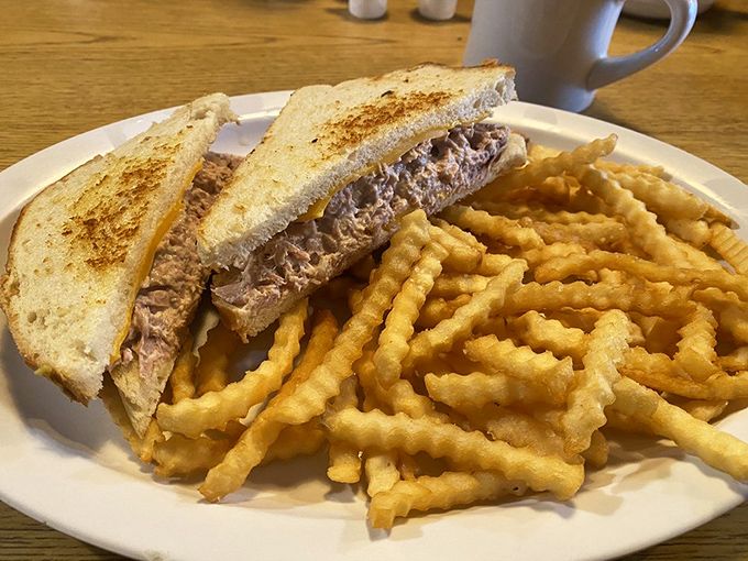 Tuna melts are the unsung heroes of diner cuisine. Crisp exterior, warm, savory interior, and those fries! Diner perfection on a plate.