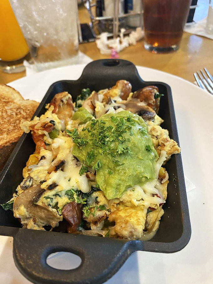 This skillet doesn't just contain breakfast&mdash;it's hosting a flavor convention. Avocado adds that California delegate to this Southern party.