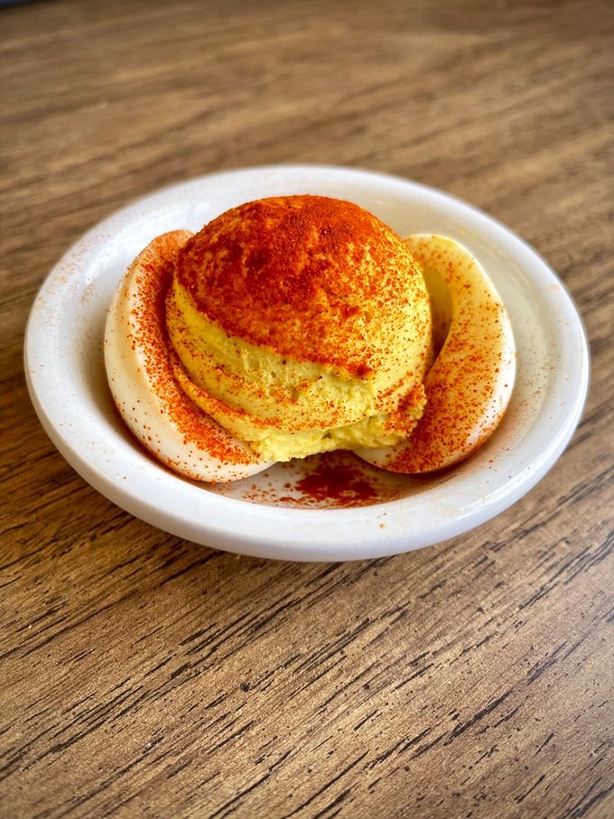 This deviled egg, dusted with paprika like a tiny sunset, isn't just a side dish&mdash;it's a statement. Grandmothers everywhere are nodding in approval.