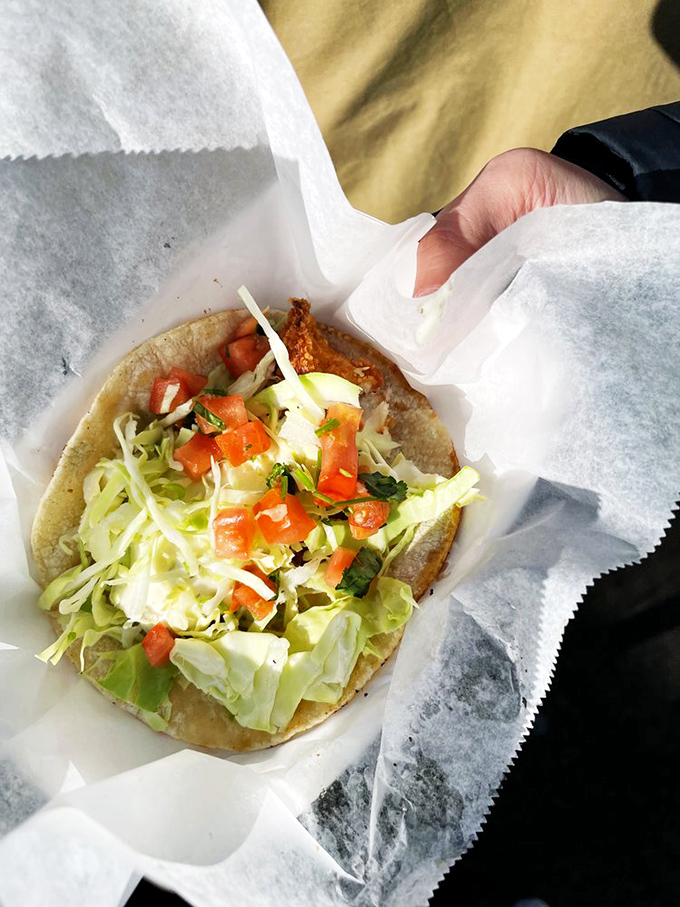 Not all heroes wear capes; some come wrapped in tortillas. This fish taco balances simplicity and flavor in every handheld bite.