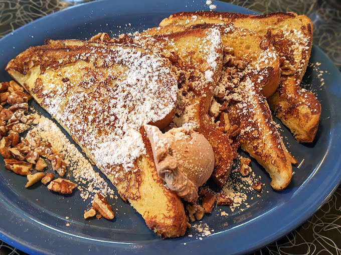 French toast that's crossed the line from breakfast to dessert, with a scoop of ice cream playing the role of morning rebel.