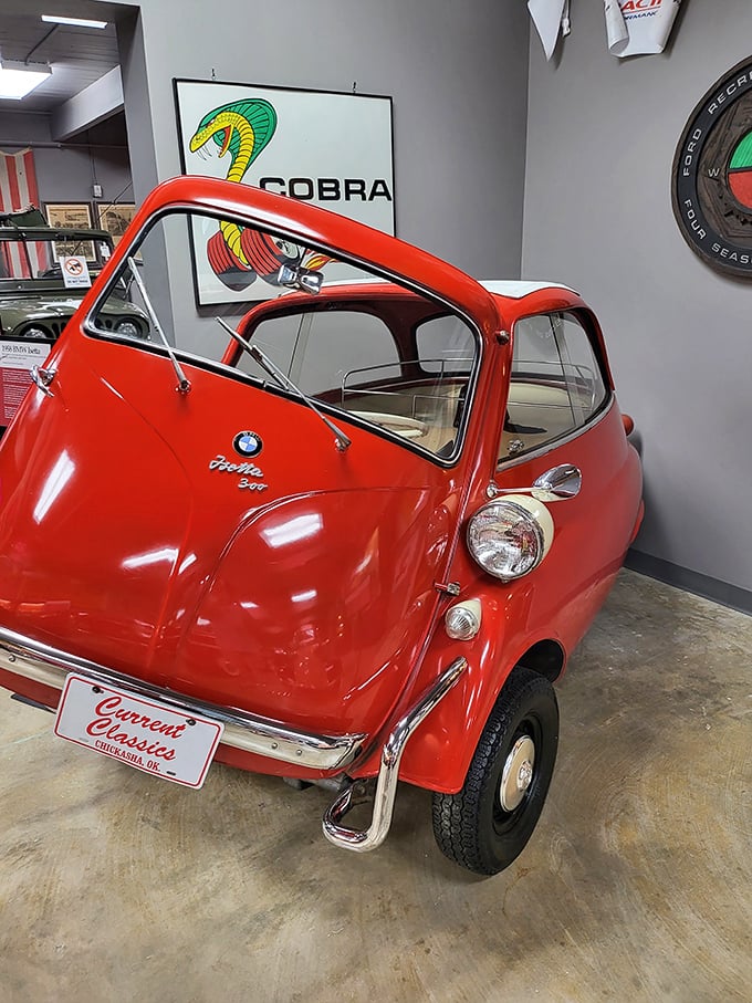The cherry-red BMW Isetta proves good things come in small packages &ndash; this bubble car's front-opening door still draws smiles from visitors of all ages.