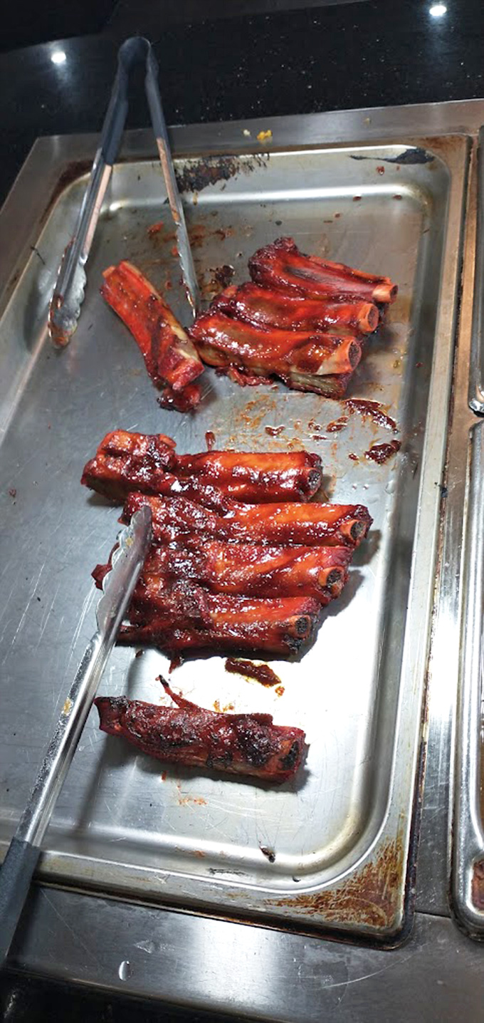 These glistening ribs aren't just falling off the bone&mdash;they're practically jumping onto your plate with saucy enthusiasm.