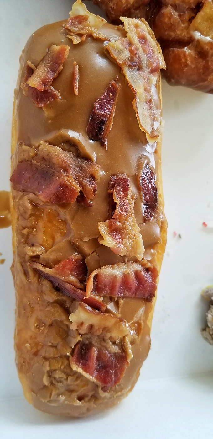 The maple bacon donut: proof that sweet and savory belong together like old friends reuniting after years apart. Worth every calorie.