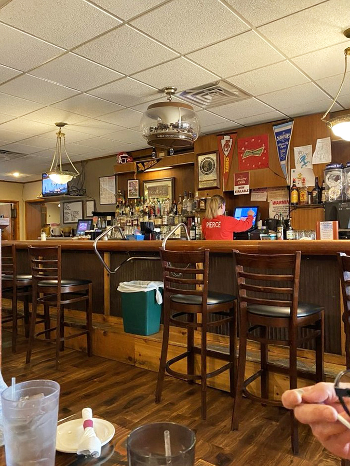 The bar area doesn't just serve drinks; it serves stories, laughter, and the occasional life advice from fellow patrons who feel like old friends.