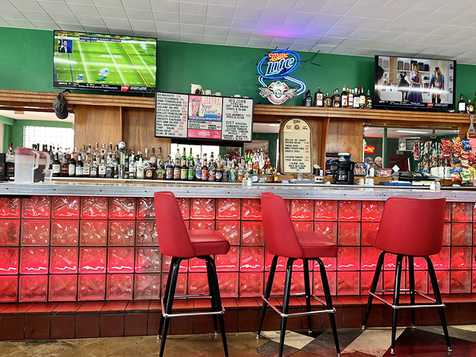 The bar area glows with neon signs and decades of stories. Where Cheers meets Midwest practicality, minus the Boston accents.