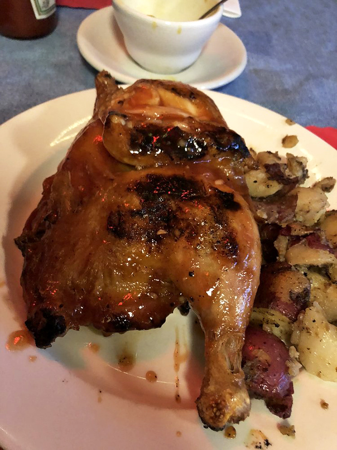 The half chicken isn't playing chicken with flavor. Smoke-kissed skin and juicy meat that makes you question why you ever eat anything else. 