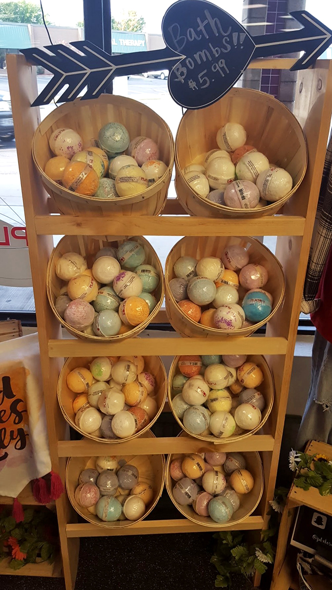 Bath bombs arranged like a colorful fruit stand offer a fragrant detour from fashion hunting&mdash;self-care meets savings in one display.