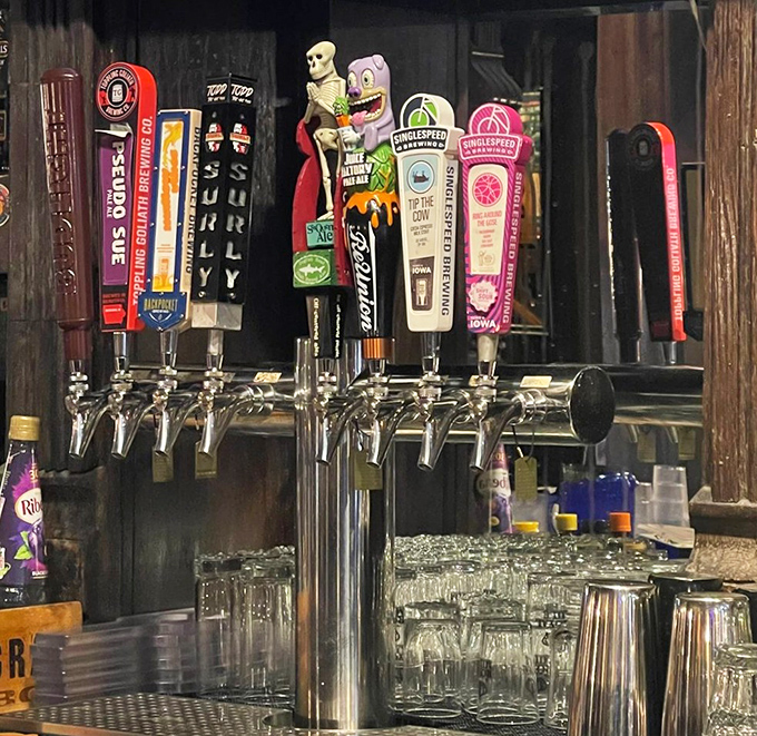 The tap lineup reads like a United Nations of beer, where Iowa craft brews negotiate peacefully with centuries-old British brewing traditions.