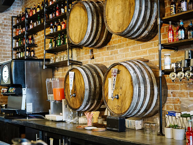 The barrel-aged drink station isn't just functional—it's a conversation piece. "Yes, I'll have whatever's flowing from that magnificent wooden vessel, please."