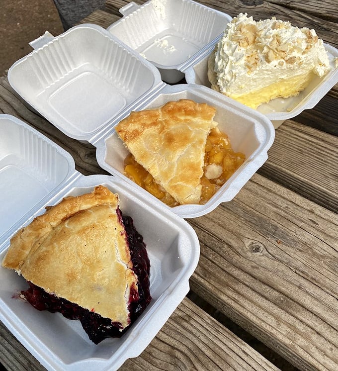 The pie trinity: three slices of heaven in to-go containers, proving good things really do come in threes. 
