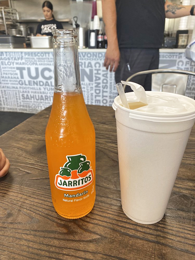 The perfect pairing: tangy Jarritos mandarin soda and creamy horchata, beverages that transport you to Arizona even as Minnesota snow falls outside.